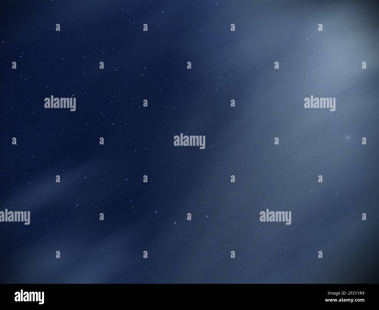 Starry Night Sky with Clouds Stock Photo - Alamy