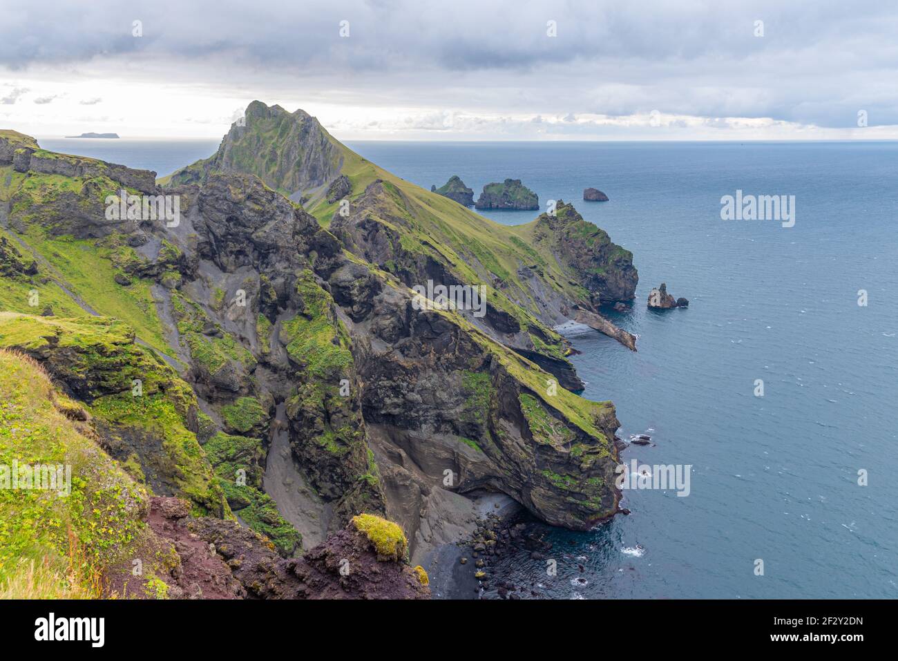 Northern cliffs of Heimaey island at Iceland Stock Photo - Alamy