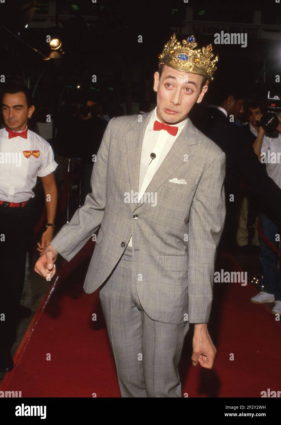 Paul Reubens as Pee Wee Herman attending the premiere of 'Purple Rain ...