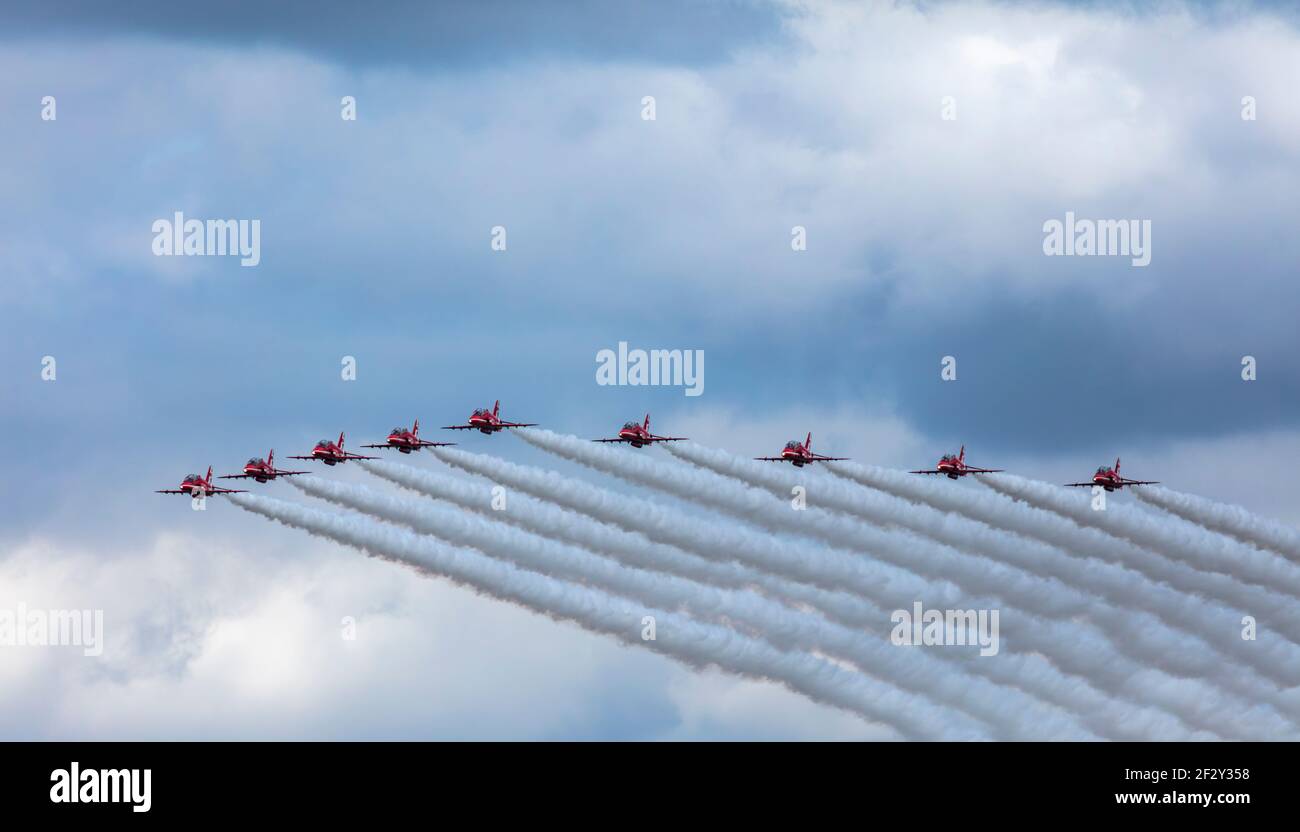 RAF Red Arrows Aerobatic Team in sky with smoke Stock Photo - Alamy