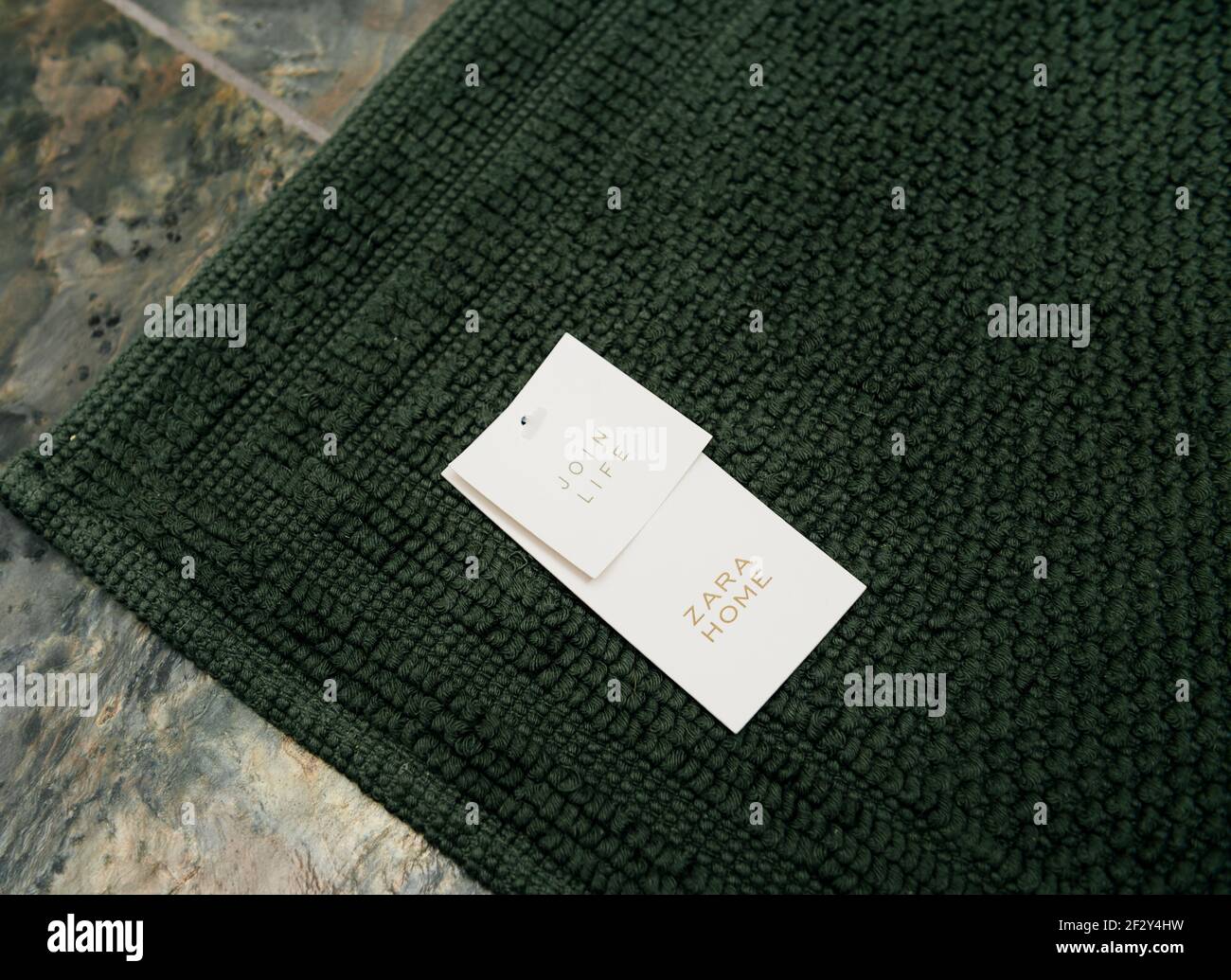 View from above at the Zara Home price tag on the bathroom floor mat ...
