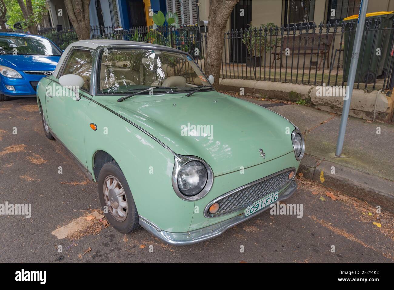 A rare example of a 1991 Nissan Figaro fixed-profile convertible parked ...