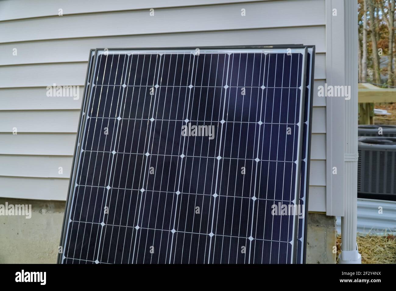 Installing alternative energy solar panels hi-res stock photography and ...