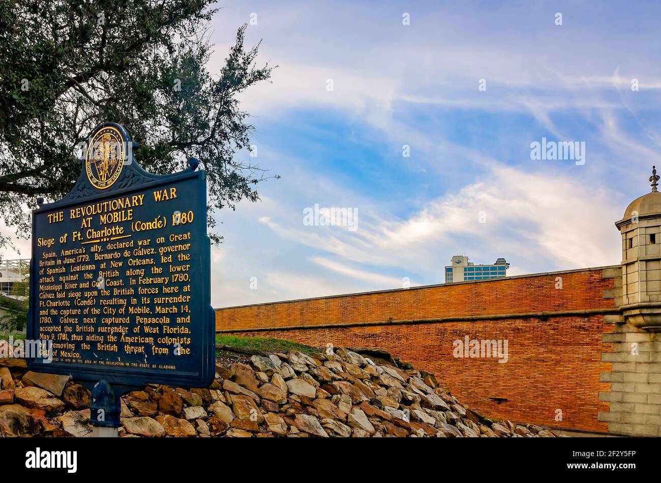 A historic marker stands outside the Fort of Colonial Mobile, used ...