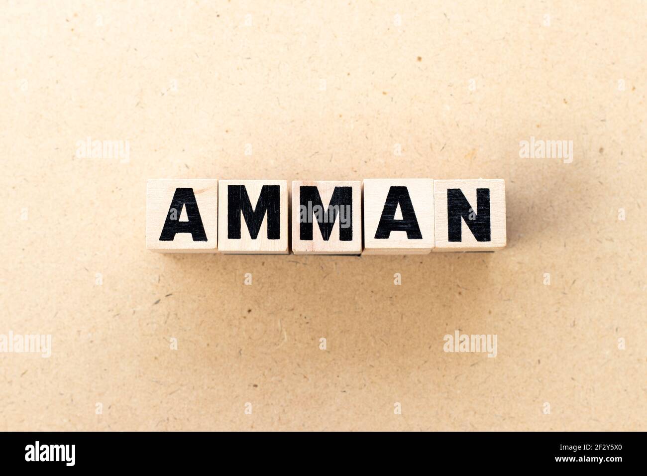 Alphabet letter block in word amman on wood background Stock Photo - Alamy