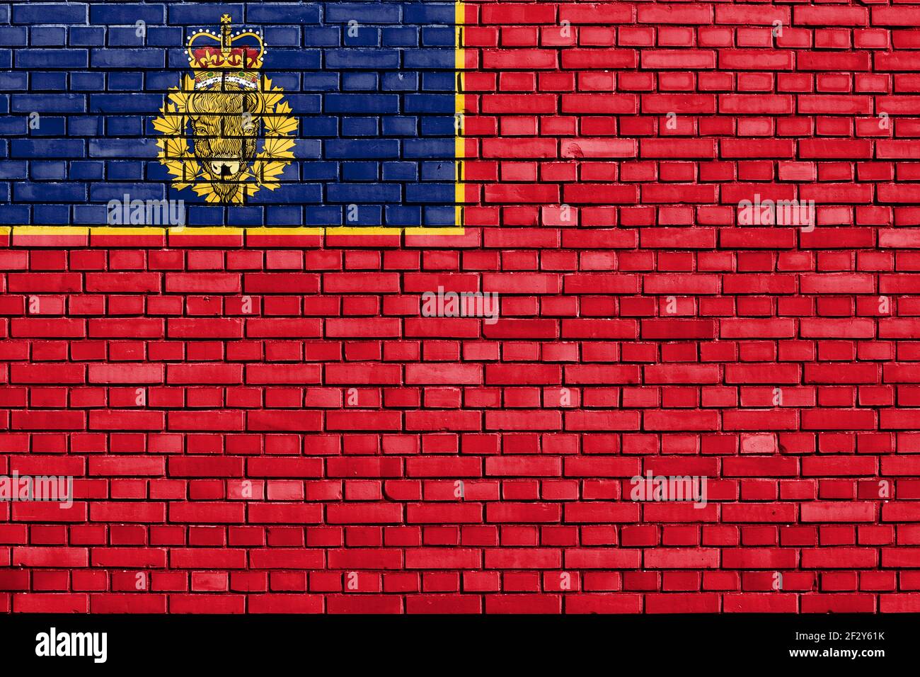 flag of Royal Canadian Mounted Police painted on brick wall Stock Photo ...