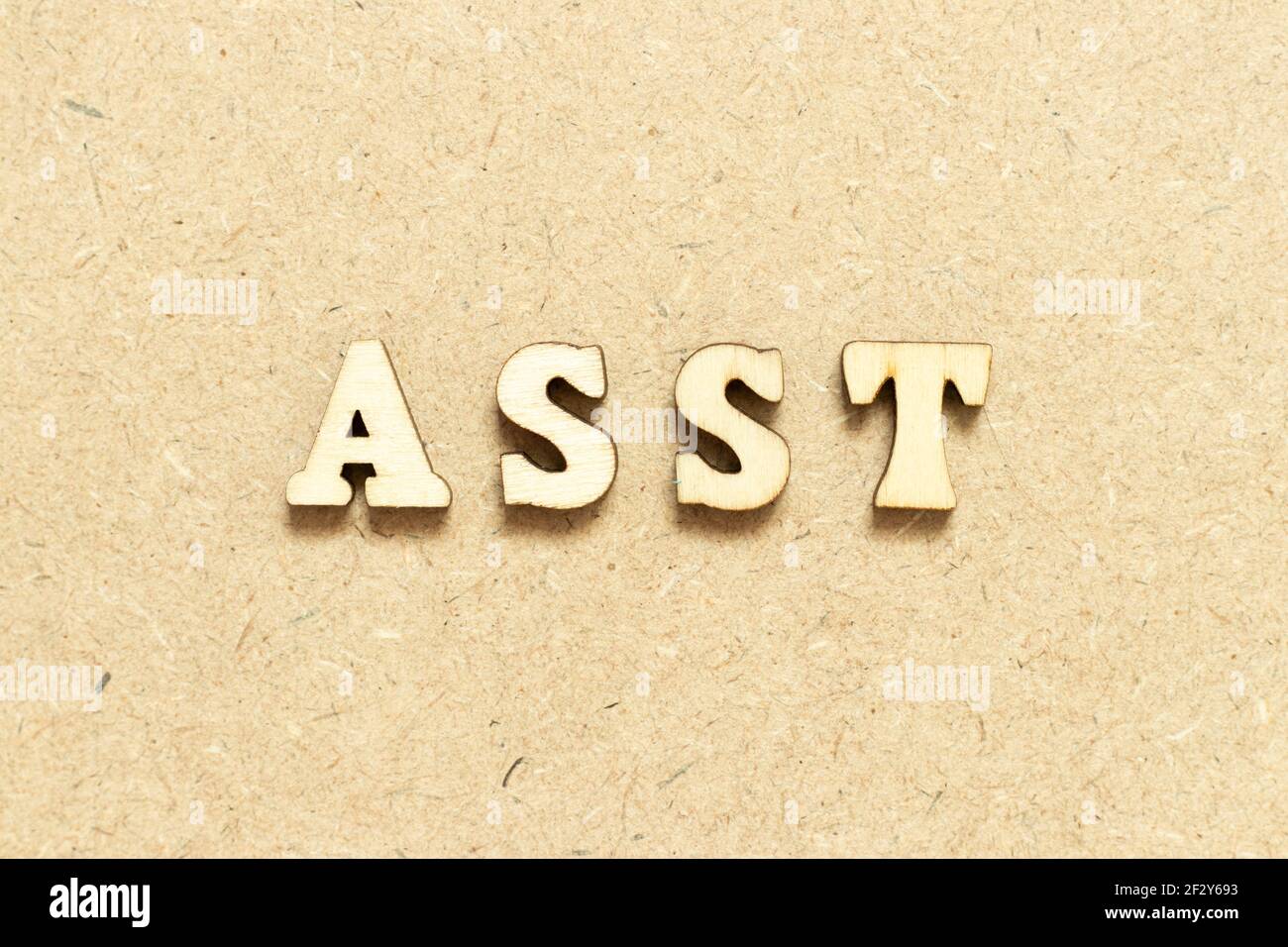 Alphabet letter in word asst (abbreviation of assistant) on wood ...