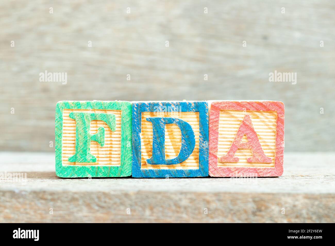 Color alphabet letter block in word FDA (abbreviation of food and drug ...