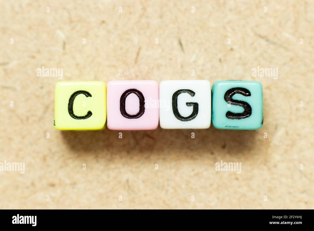 Color alphabet letter block in word COGS (Abbreviation of Cost of goods ...