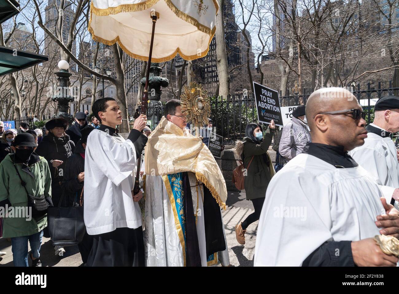New York, United States. 13th Mar, 2021. Clergy and members of Roman ...