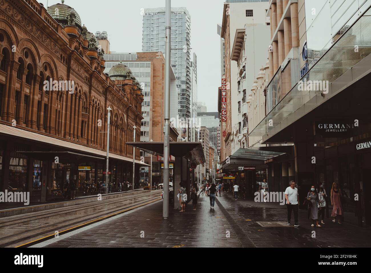 People waiting for the light rail at the Queen Victoria Building QVB ...