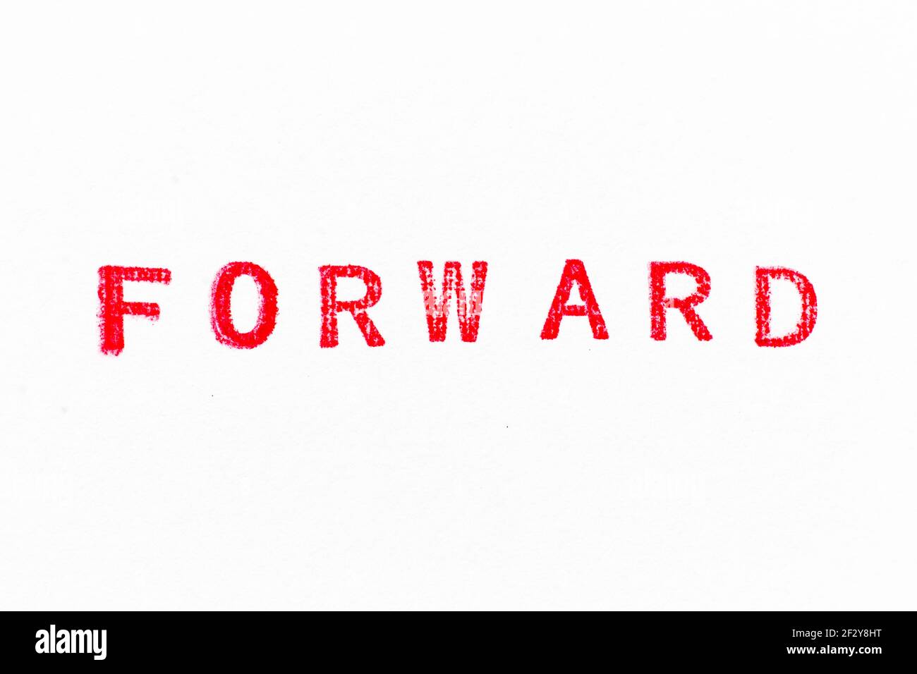 Red color ink rubber stamp in word forward on white paper background ...