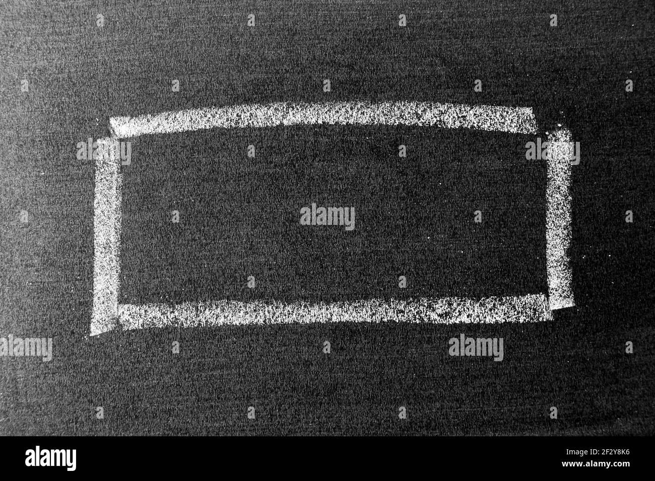 White color chalk hand drawing as square or rectangle shape on ...