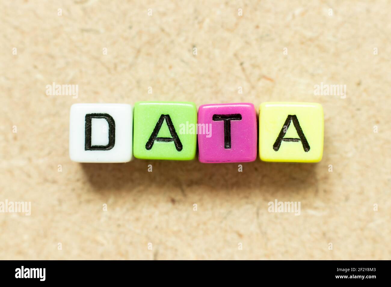 Color alphabet letter block in word data on wood background Stock Photo ...