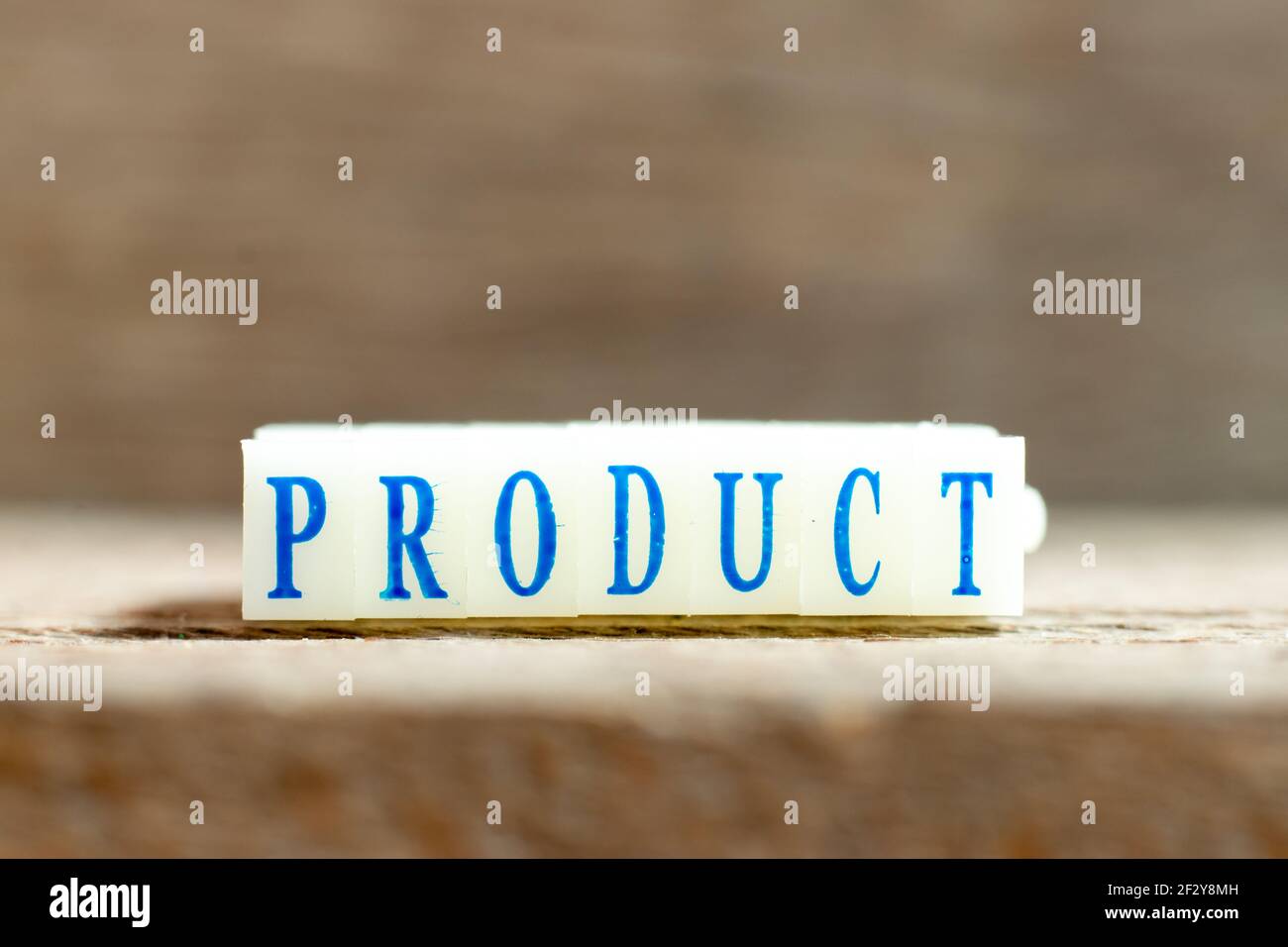 Letter block with blue color word product on wood background Stock ...