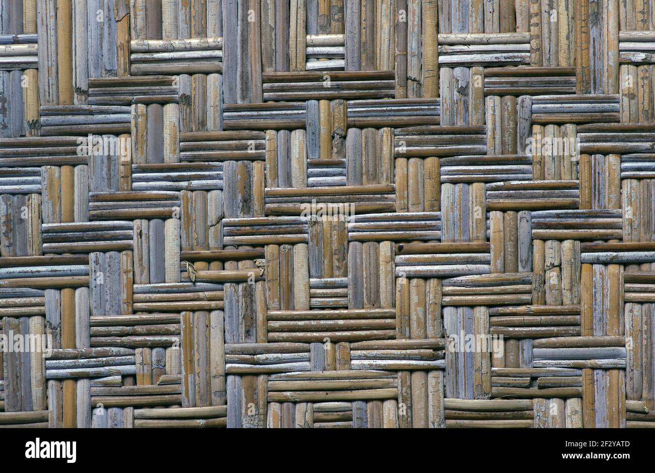 A handicraft made from old rattan. Nature background Stock Photo - Alamy