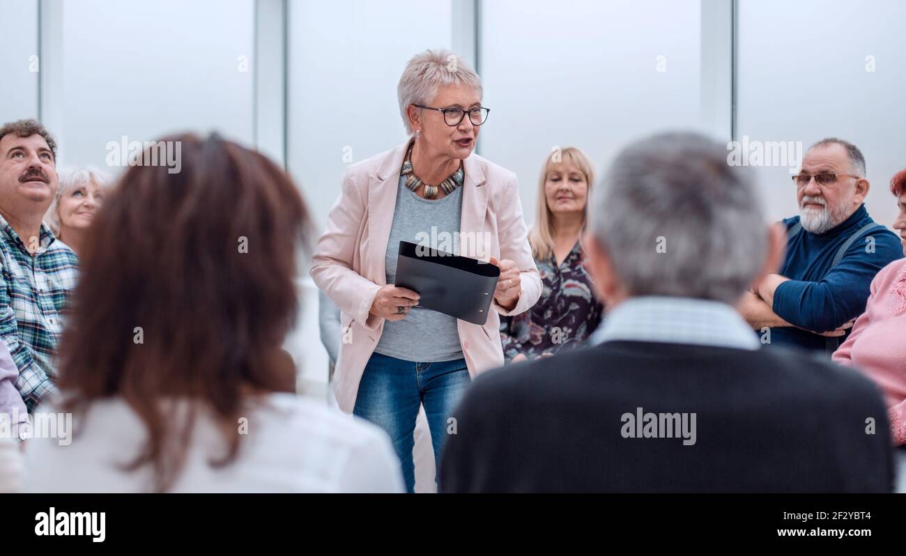 old lady teaches old people Stock Photo - Alamy