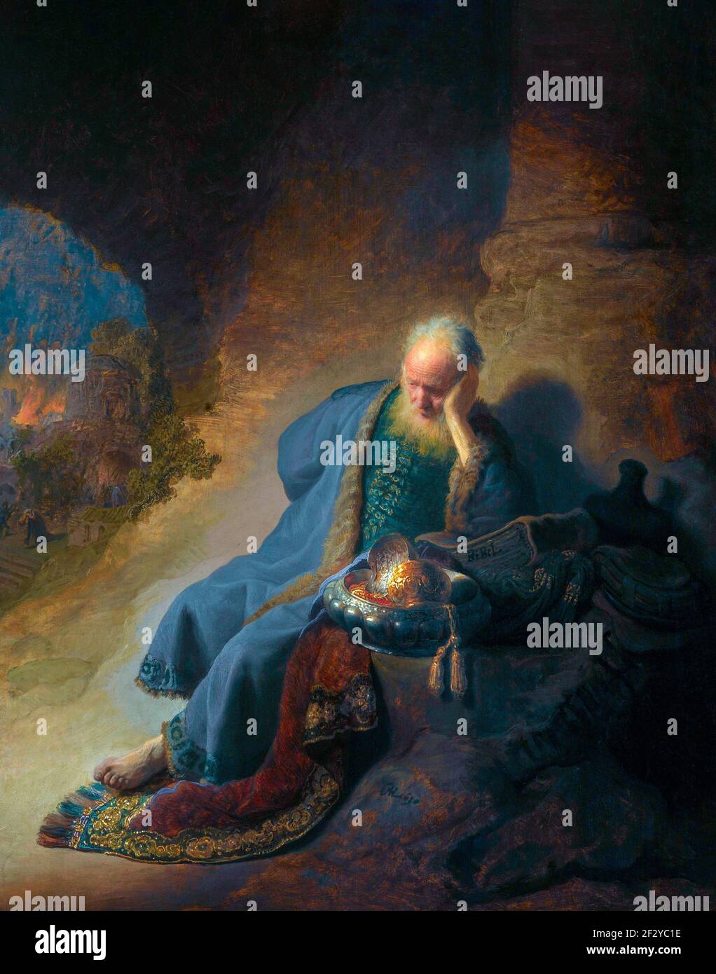 Jeremiah mourning the destruction of Jerusalem. The old prophet sits on ...