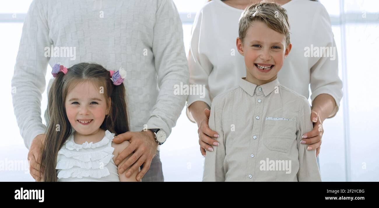 portrait of a happy family with small children Stock Photo - Alamy