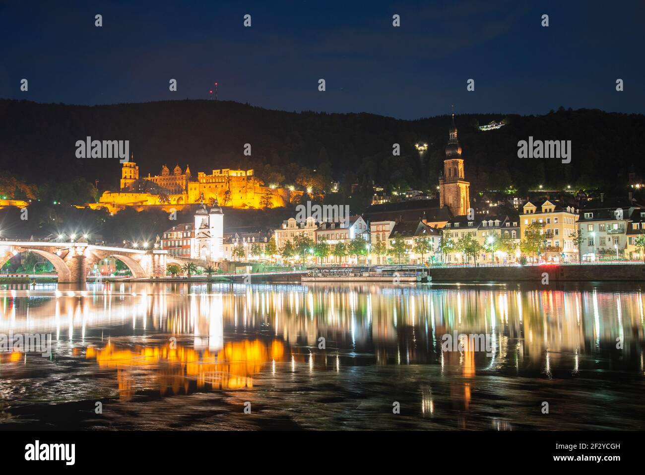 Sunset view of Heidelberg behind Neckar river, Germany Stock Photo - Alamy
