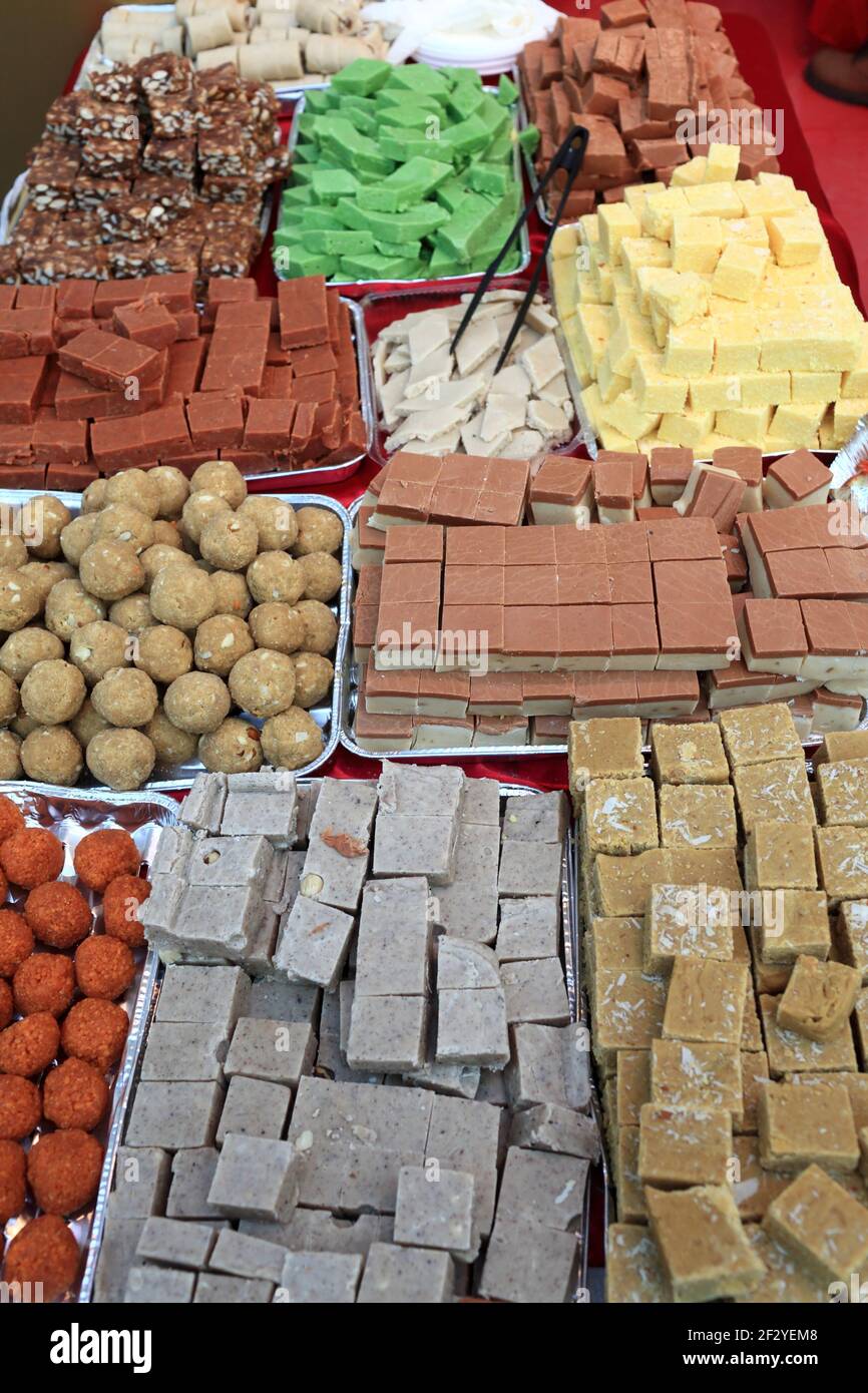 View of indian sweets at a market Stock Photo - Alamy