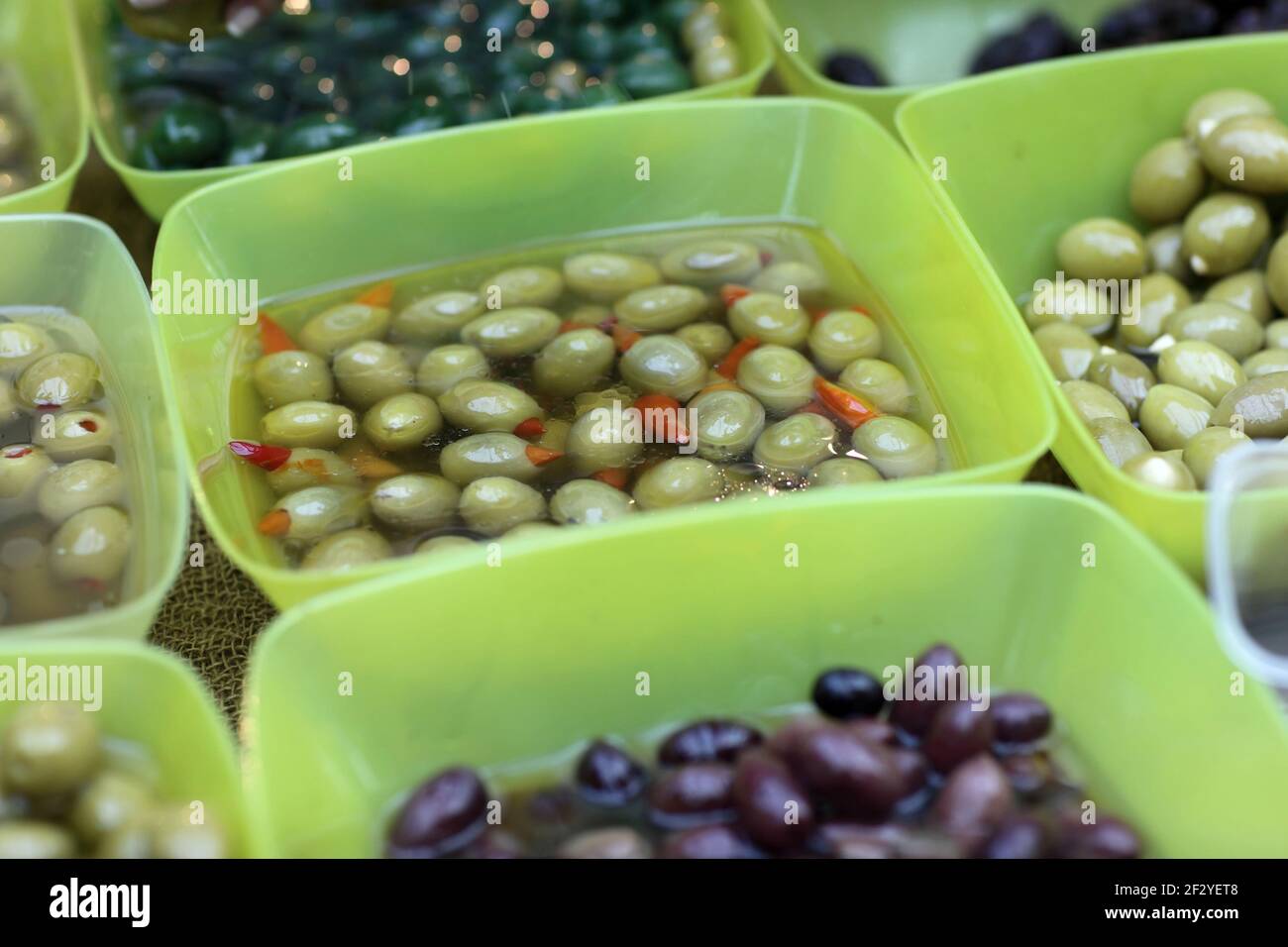 Stuffed olives in the boxes at market Stock Photo - Alamy