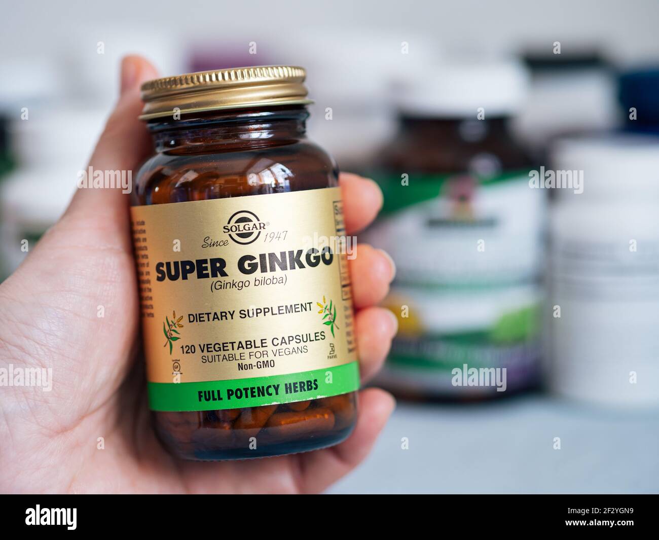 Moscow, Russia - March 09, 2021: Glass jar with Ginkgo capsules in ...