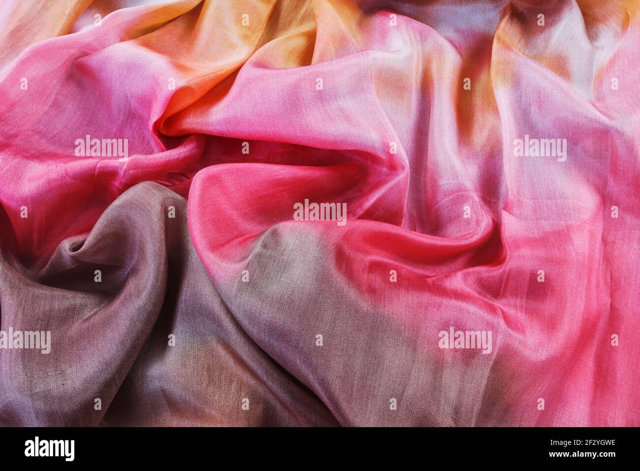 Pink and orange silk fabric. Graphic resources Stock Photo - Alamy