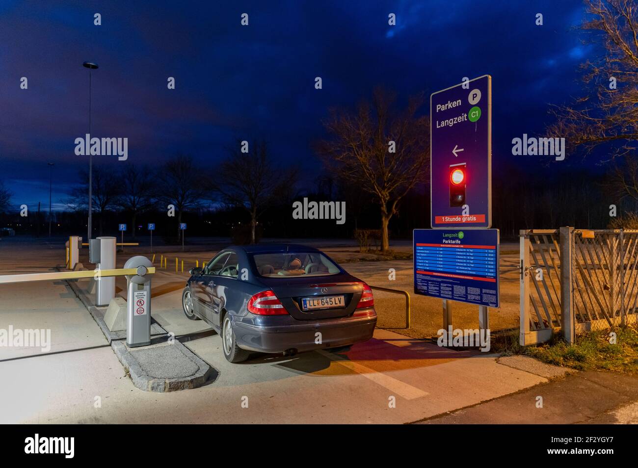 mercedes benz clk 270 cdi at an empty car park at the airport of linz ...