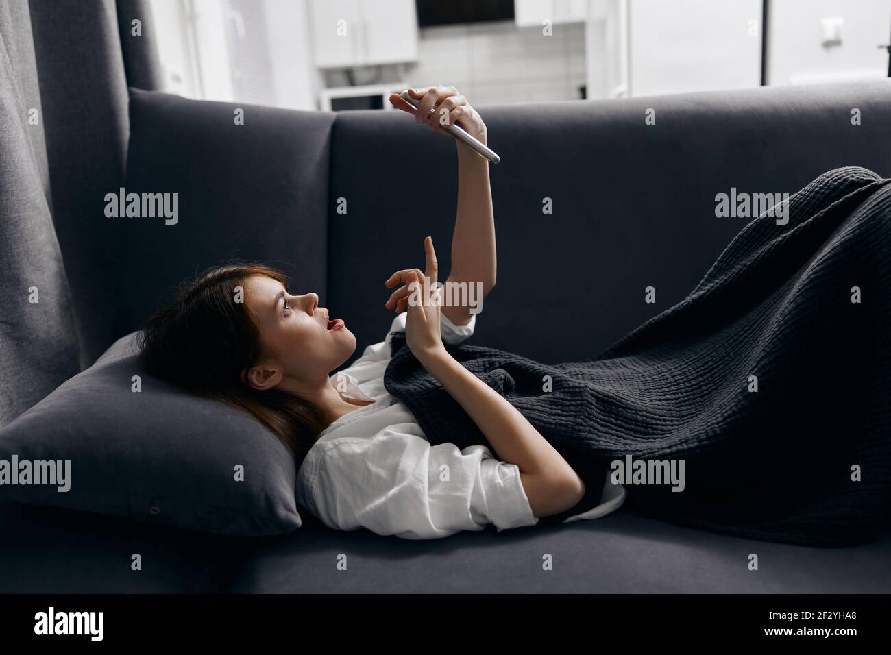 Browsing on smart phone night hi-res stock photography and images - Alamy