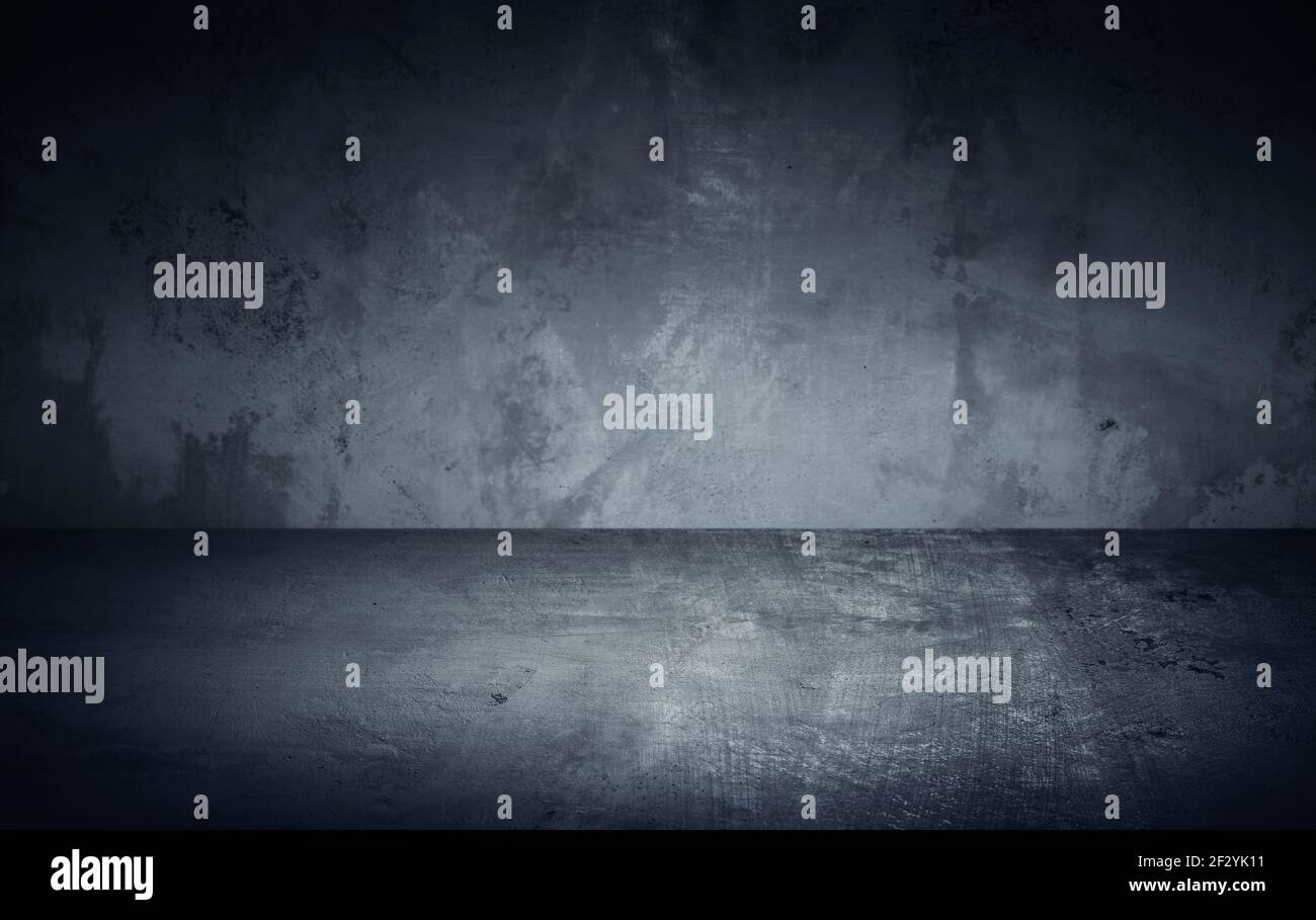 Dark room in beam of light with concrete wall and floor. Texture ...