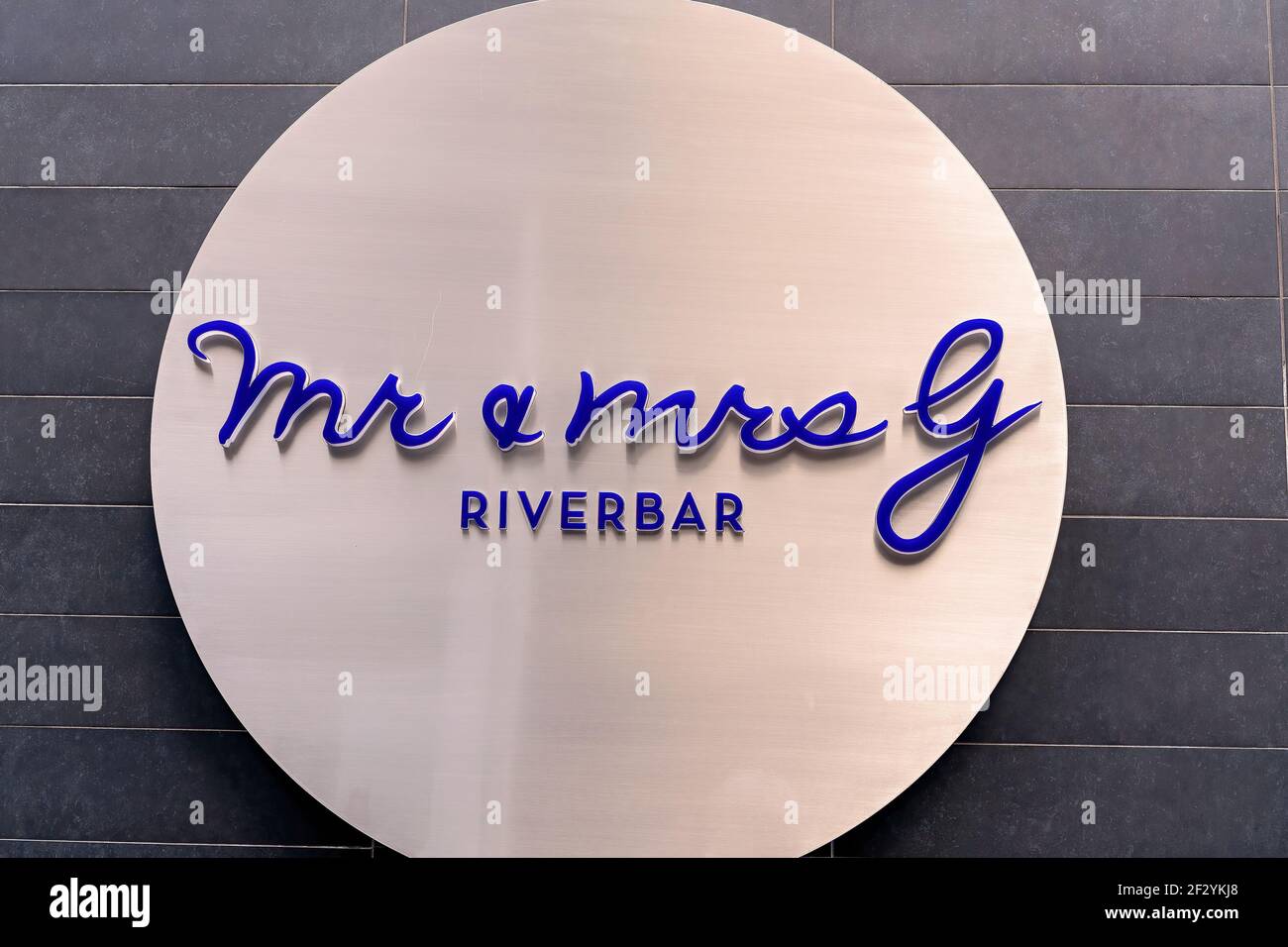 Brisbane, Queensland, Australia- March 2021: Circular white bar signage ...