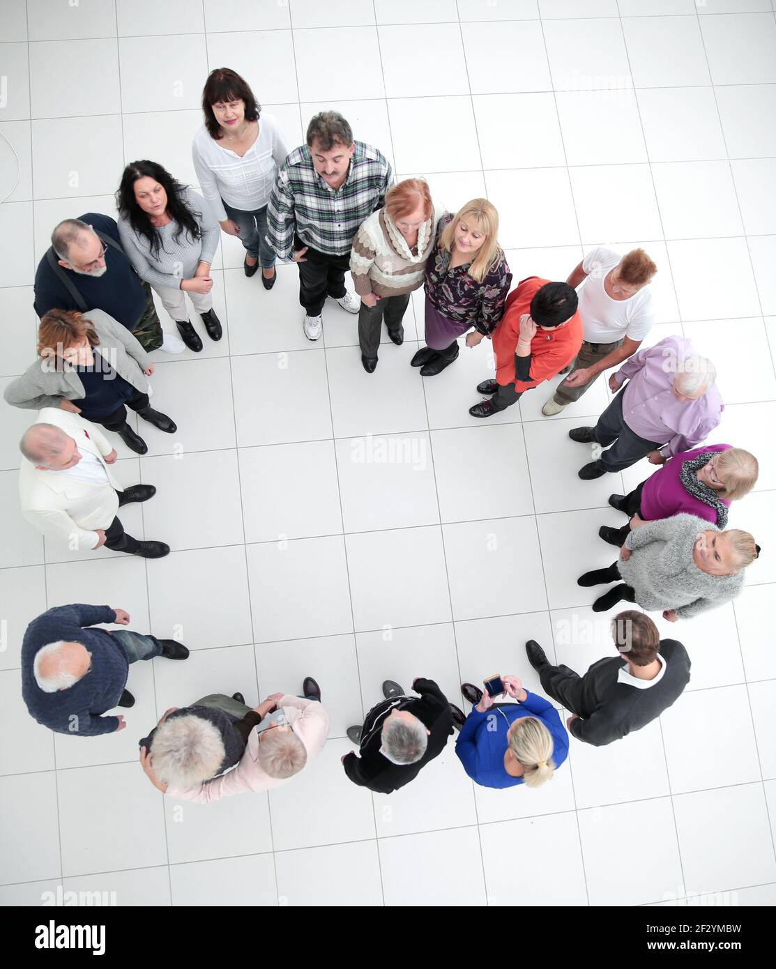 group of casual senior people standing in a circle Stock Photo - Alamy