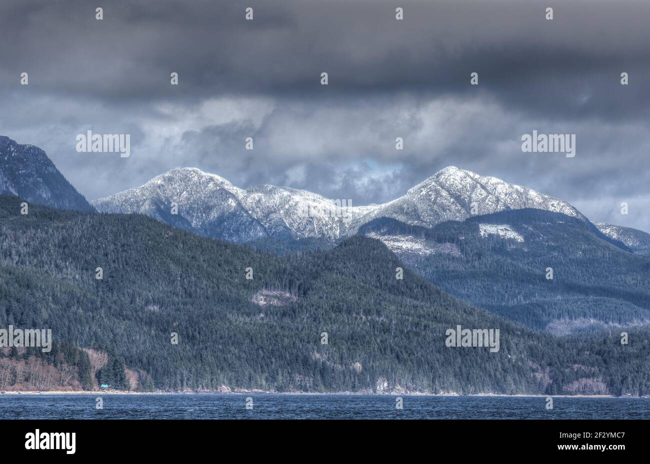 fresh snow on distant hills on Vancouver Island, BC, Canada Stock Photo ...