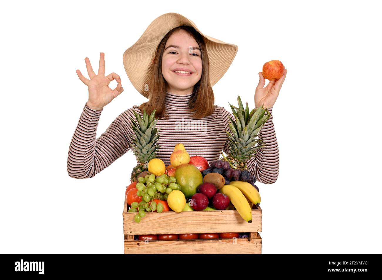 happy girl with apple and ok hand sign Stock Photo - Alamy