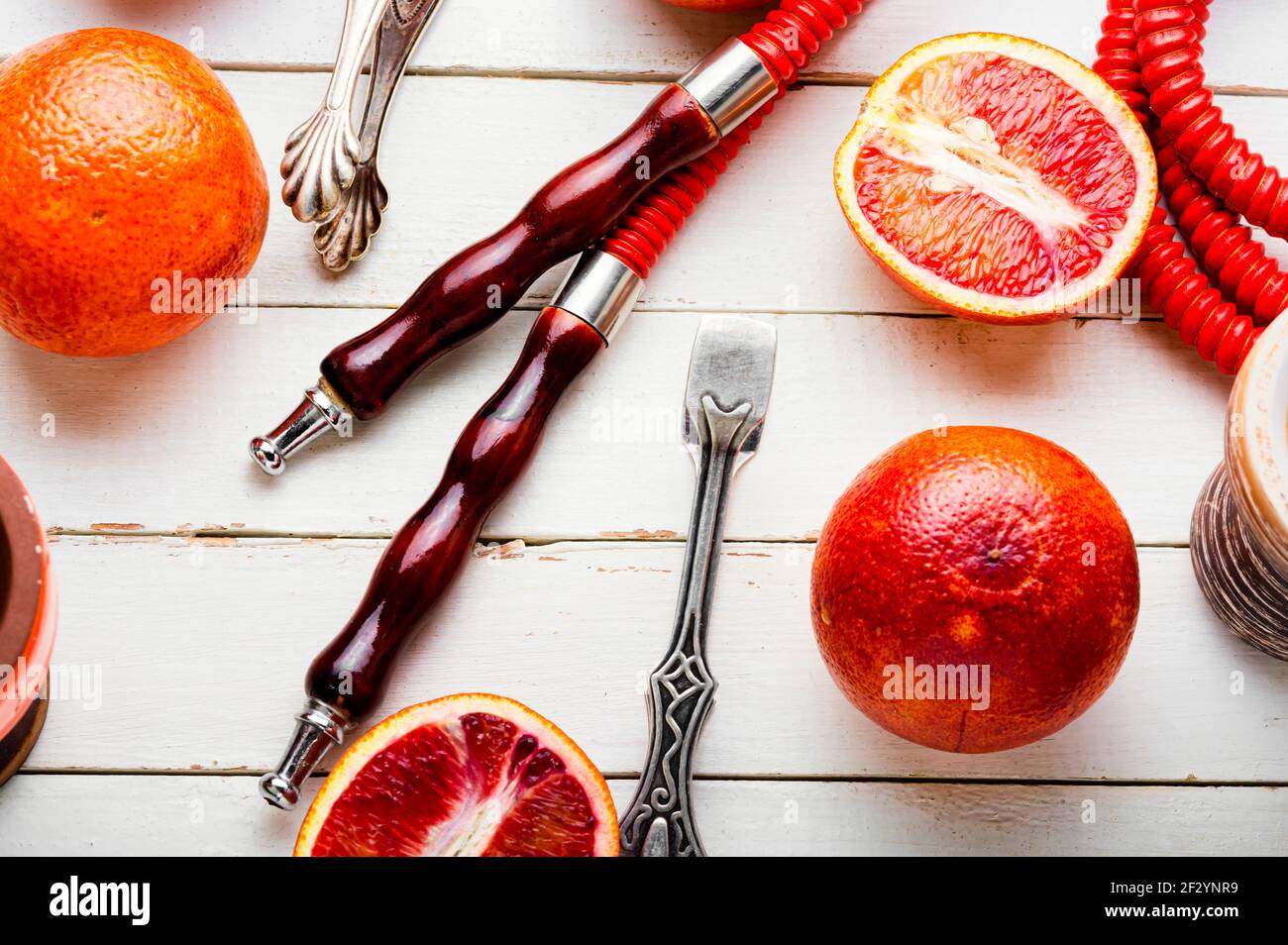 Eastern smoking hookah or shisha with tobacco with grapefruit flavor ...