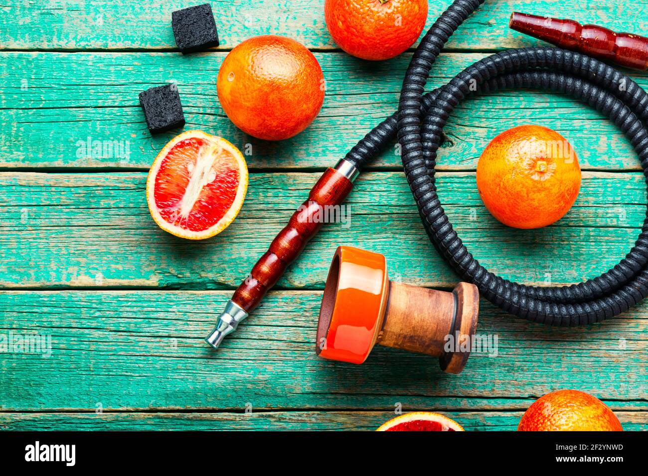 Oriental smoking hookah or shisha with tobacco with grapefruit flavor ...