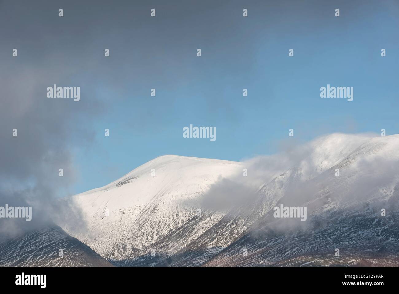 Stunning landscape image of Skiddaw snow capped mountain range in Lake ...