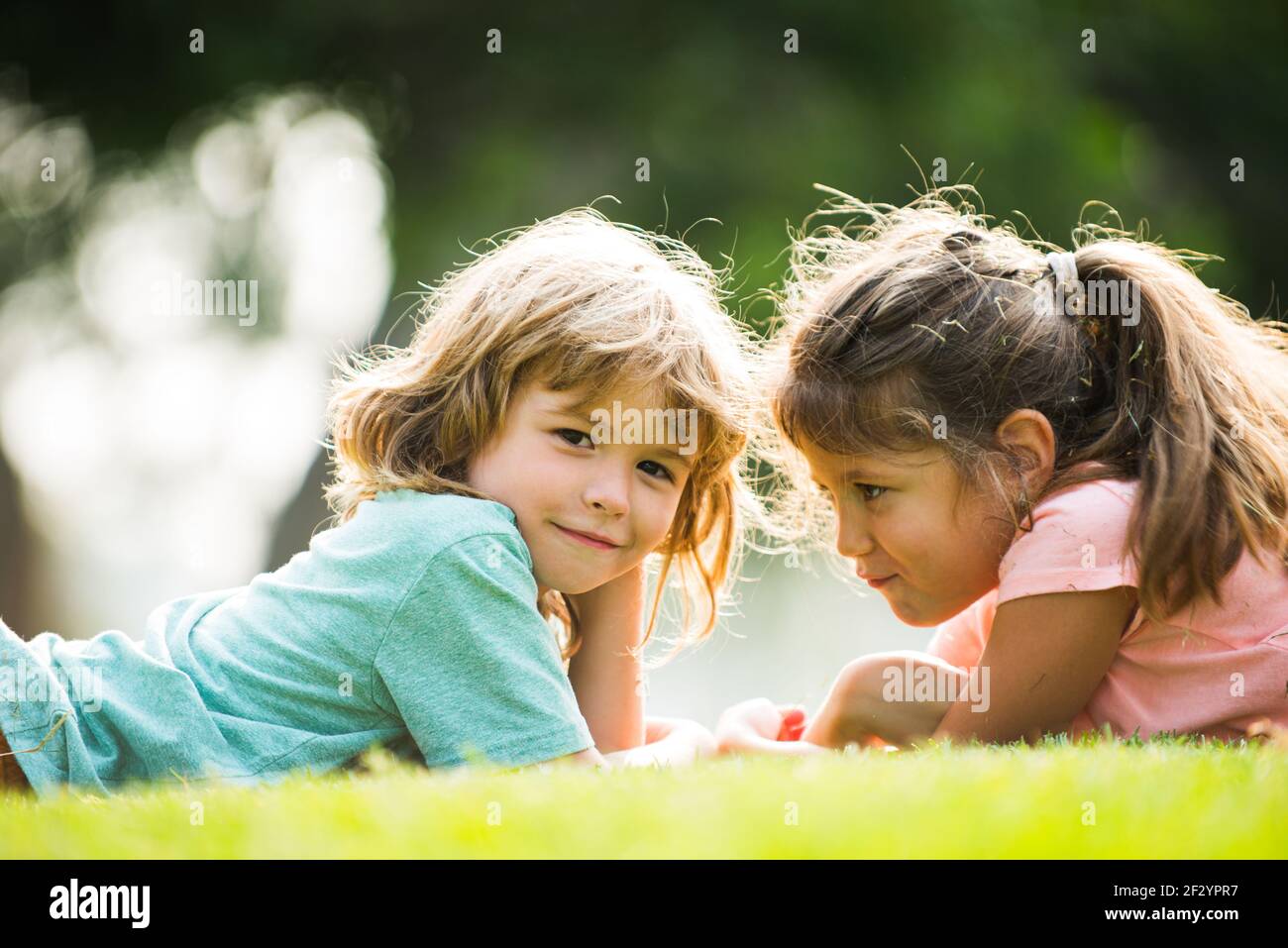 Cute couple of kids in love. Children relationships. Little boy girl ...