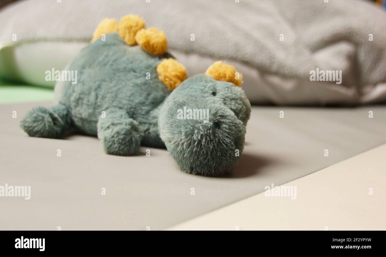 soft baby Dino toy Stock Photo - Alamy