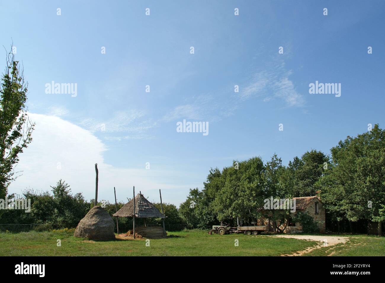 Rural landscape, farm yard with a haystack Stock Photo - Alamy
