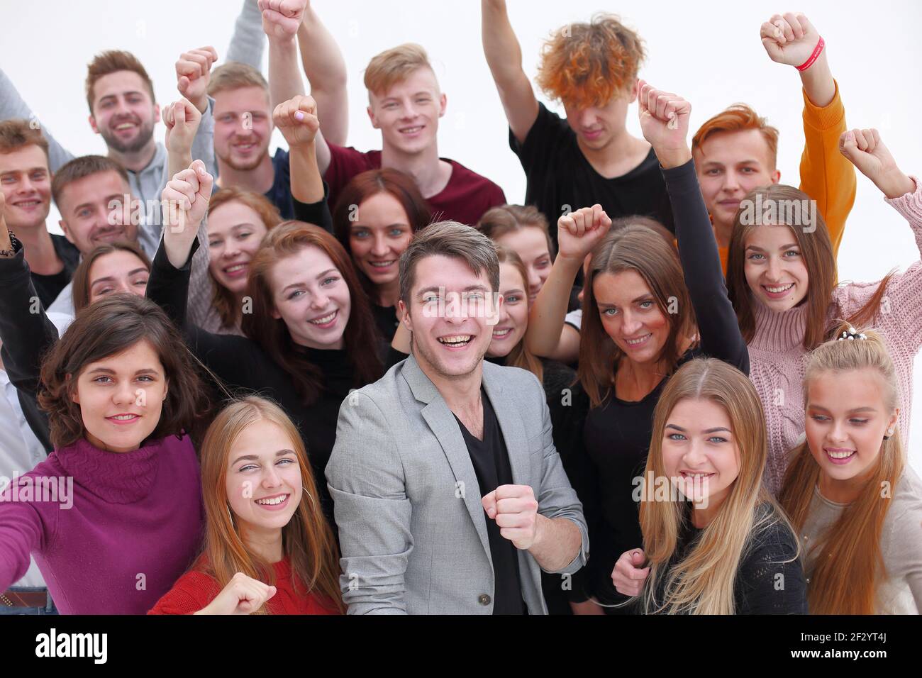 close up. happy young people showing their success Stock Photo - Alamy