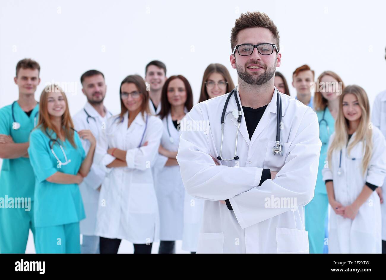 top view. a group of smiling doctors pointing at you Stock Photo - Alamy