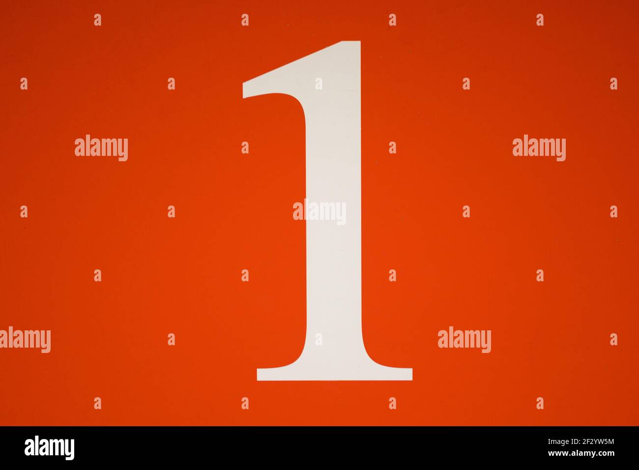 Colorful red and white sign with the number one - 1 - stencilled in the ...