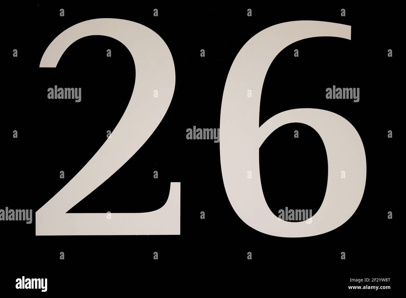 High contrast black and white sign with the stencilled number twenty ...