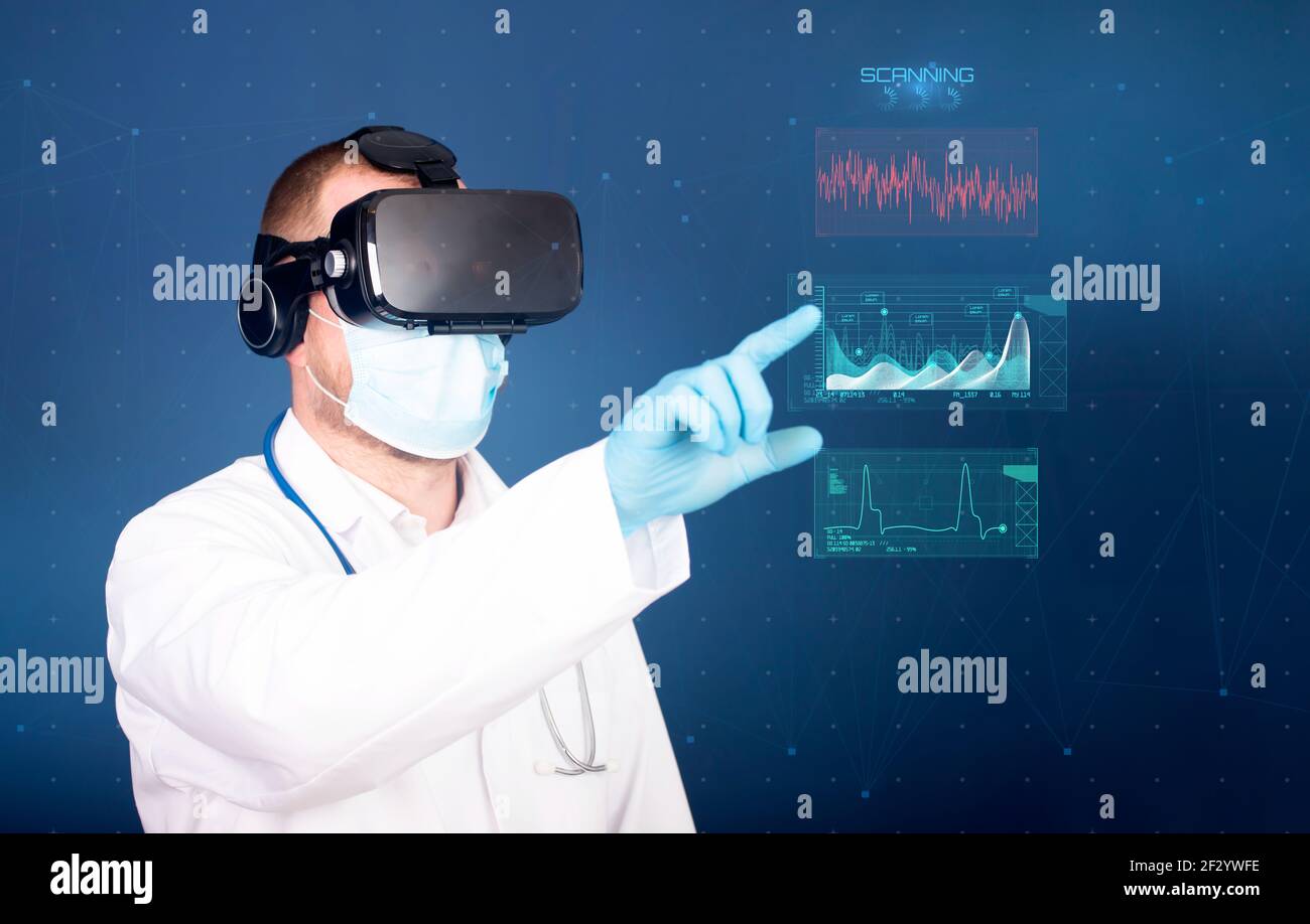 Medical technology concept. Doctor wearing virtual reality glasses ...