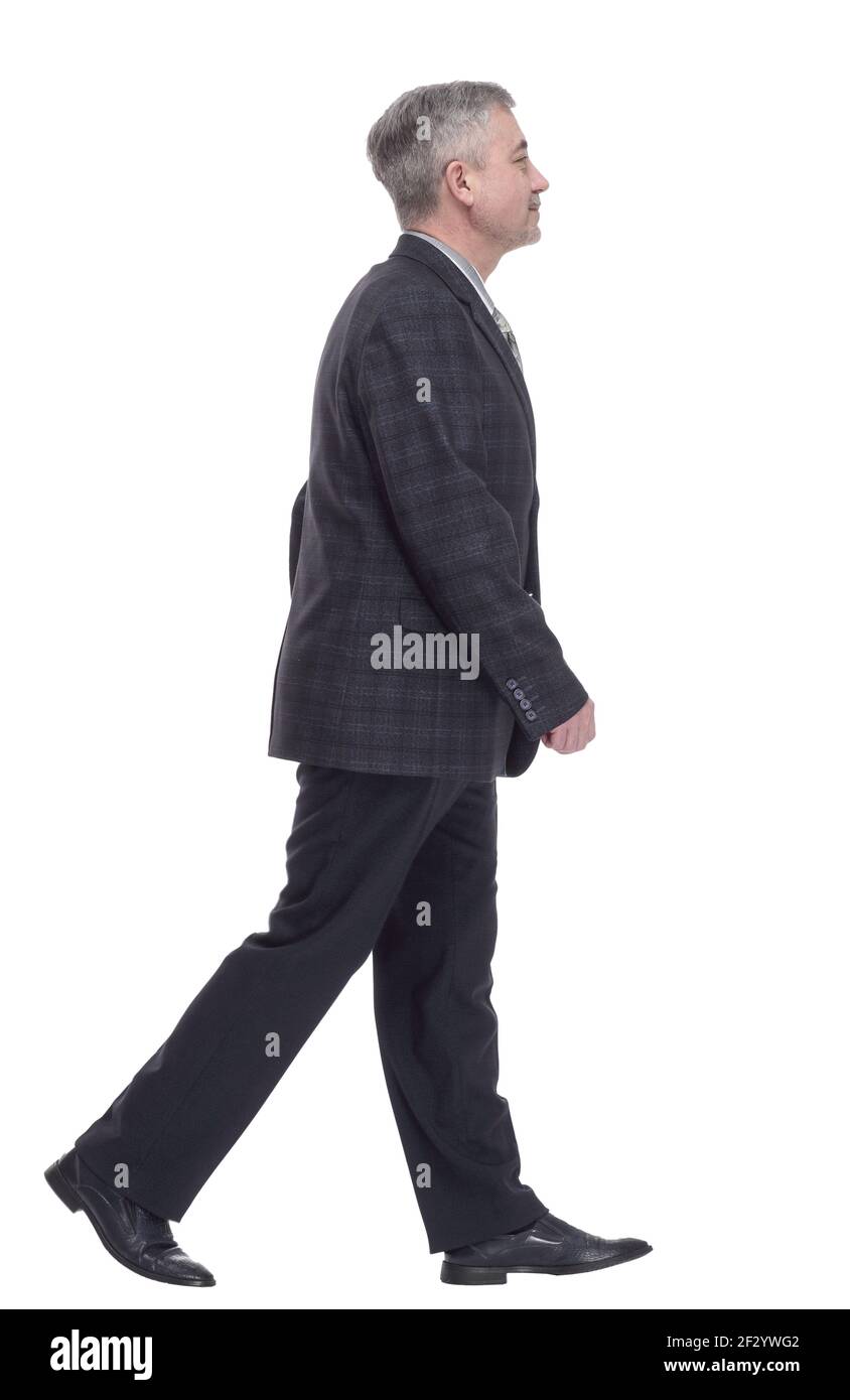 confident adult male striding forward . isolated on a white Stock Photo ...