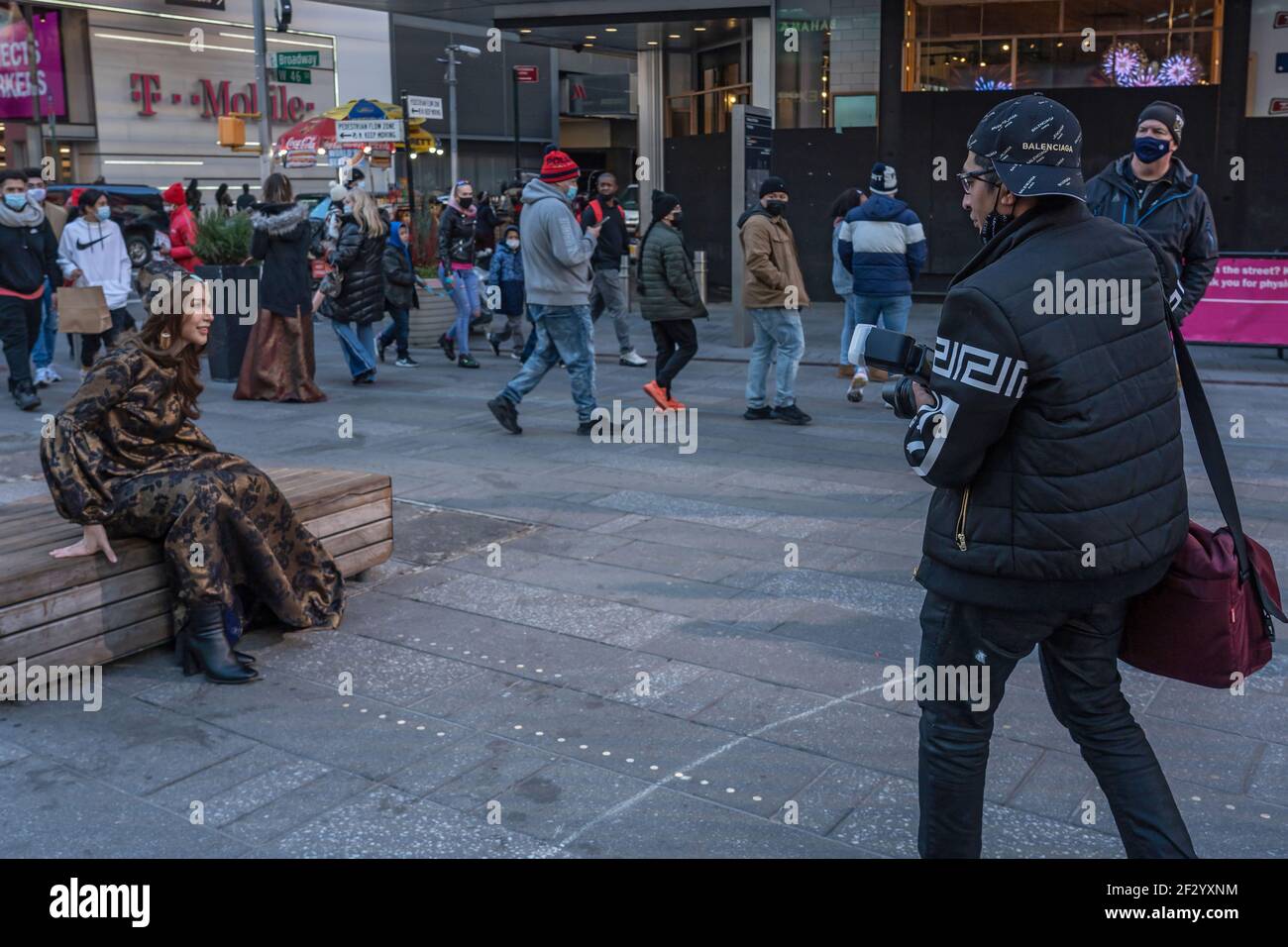 A model poses for a photo during a fashion shoot in Manhattan's Times ...