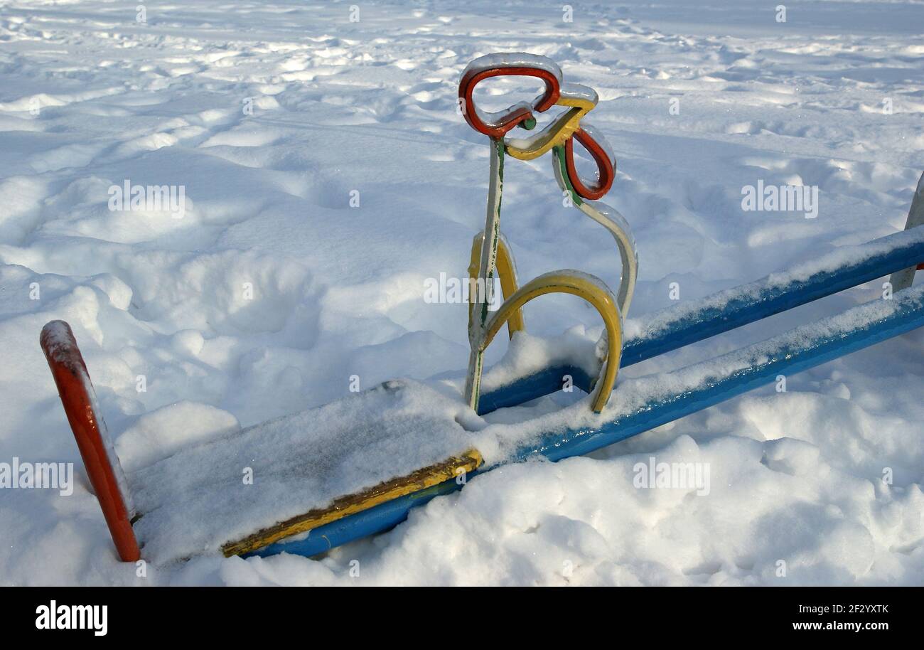 Moscow (Russia) snow storm leaves a children's park playground ...