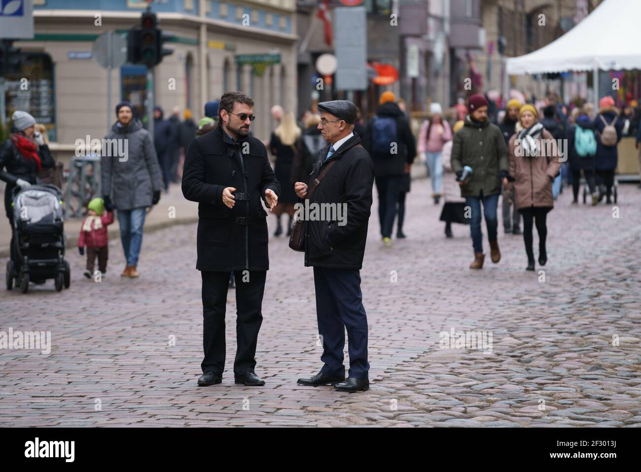 Senior talking to young uk hi-res stock photography and images - Alamy